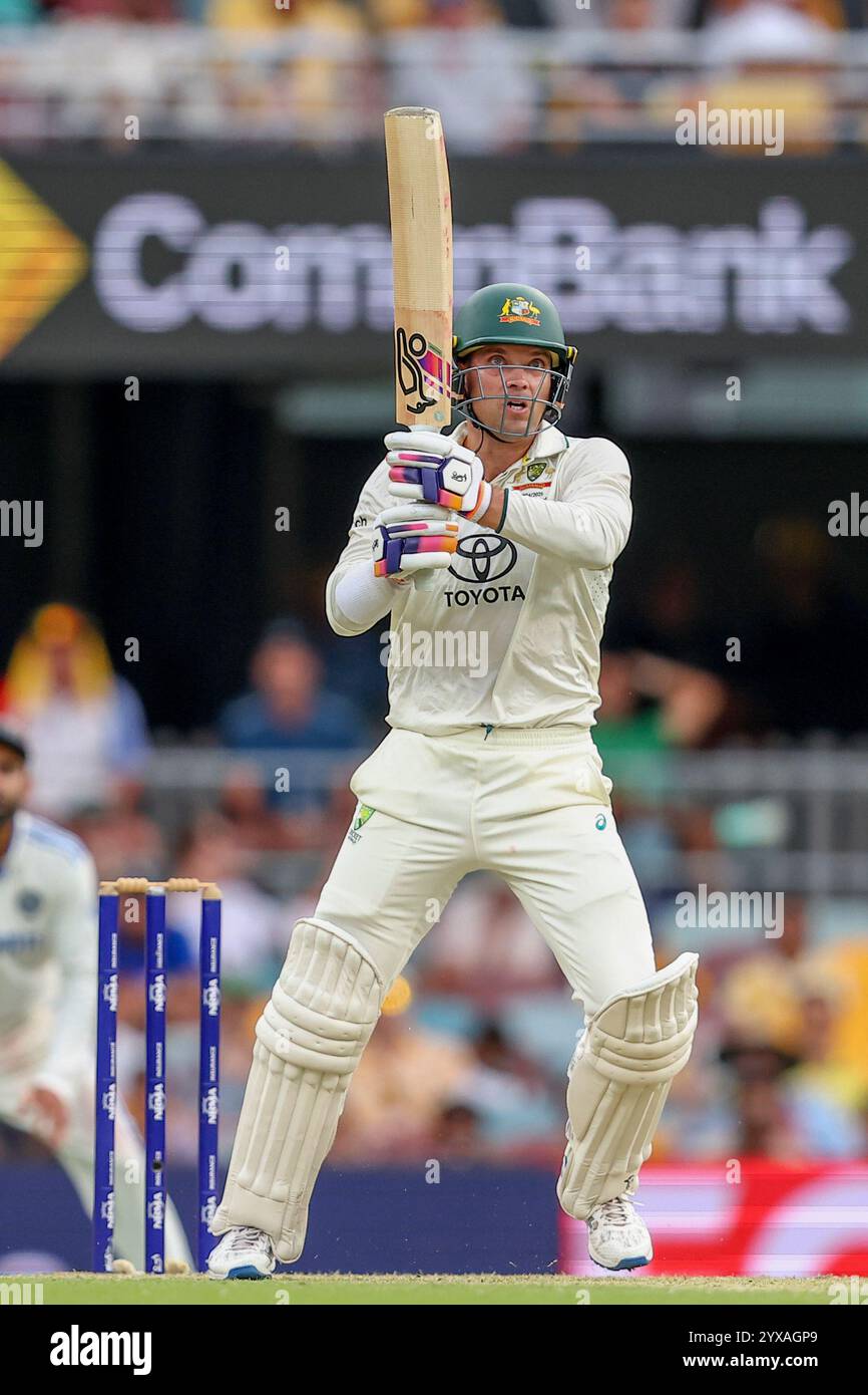 Australia's Alex Carey watches the ball after playing a shot during ...