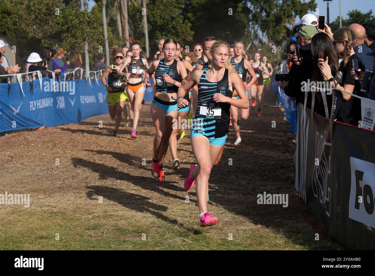 Libby Dowty places fifth in the girls race in 17:55.9 during the Foot Locker Cross Country ...