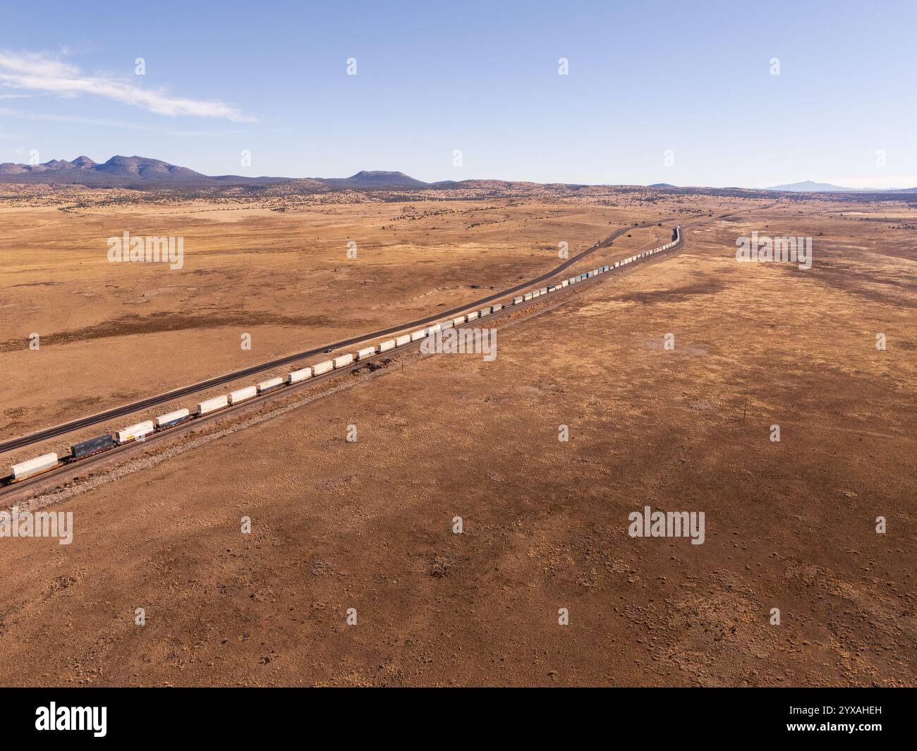 Aerial view of american freight train with double stacked containers ...