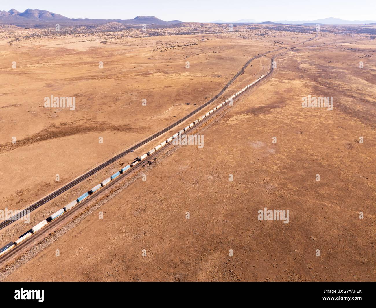 Aerial view of american freight train with double stacked containers ...