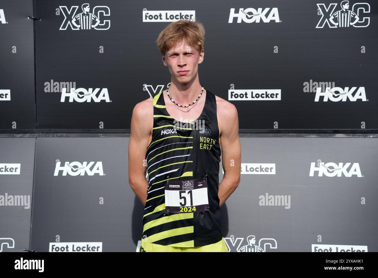 Jack Graffeo poses after placing third in 15:34.5 during the Foot ...