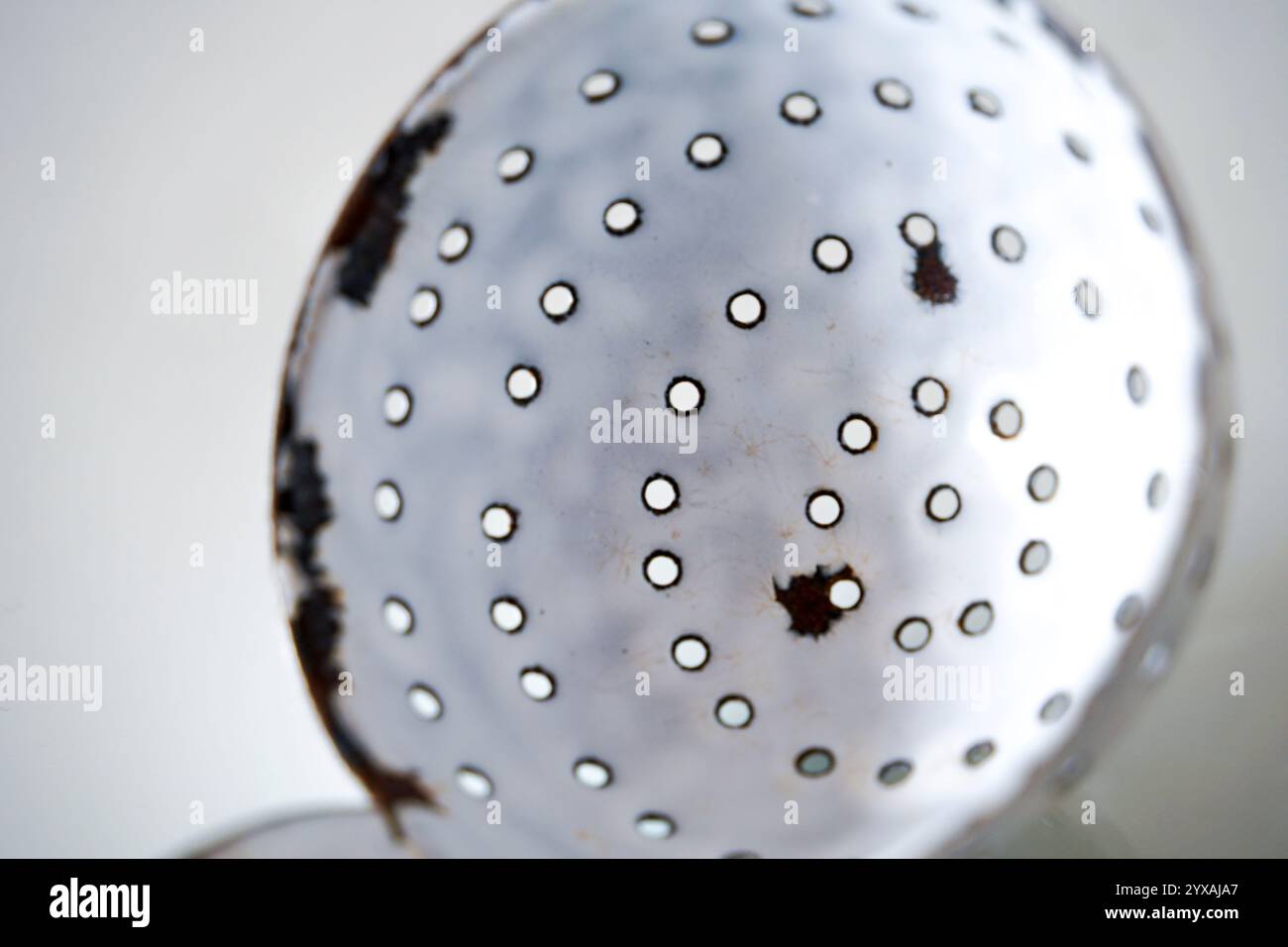 Antique ladle with holes as object photo on the subject of kitchen ...