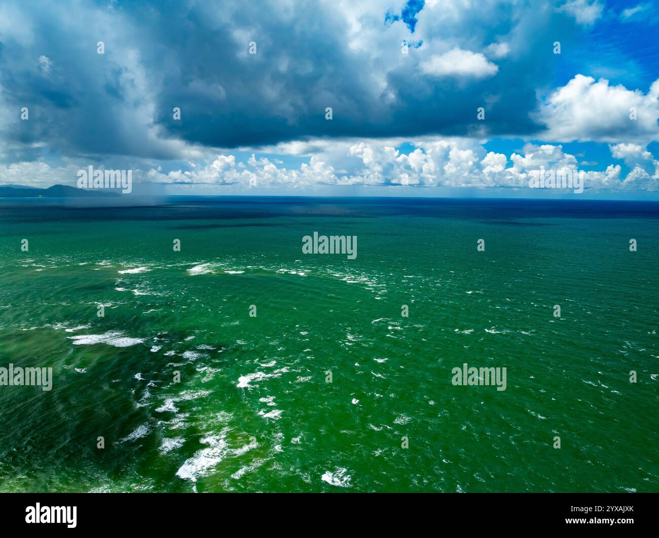 Aerial view of blue sea surface water texture background,Amazing sun reflections Aerial flying ...