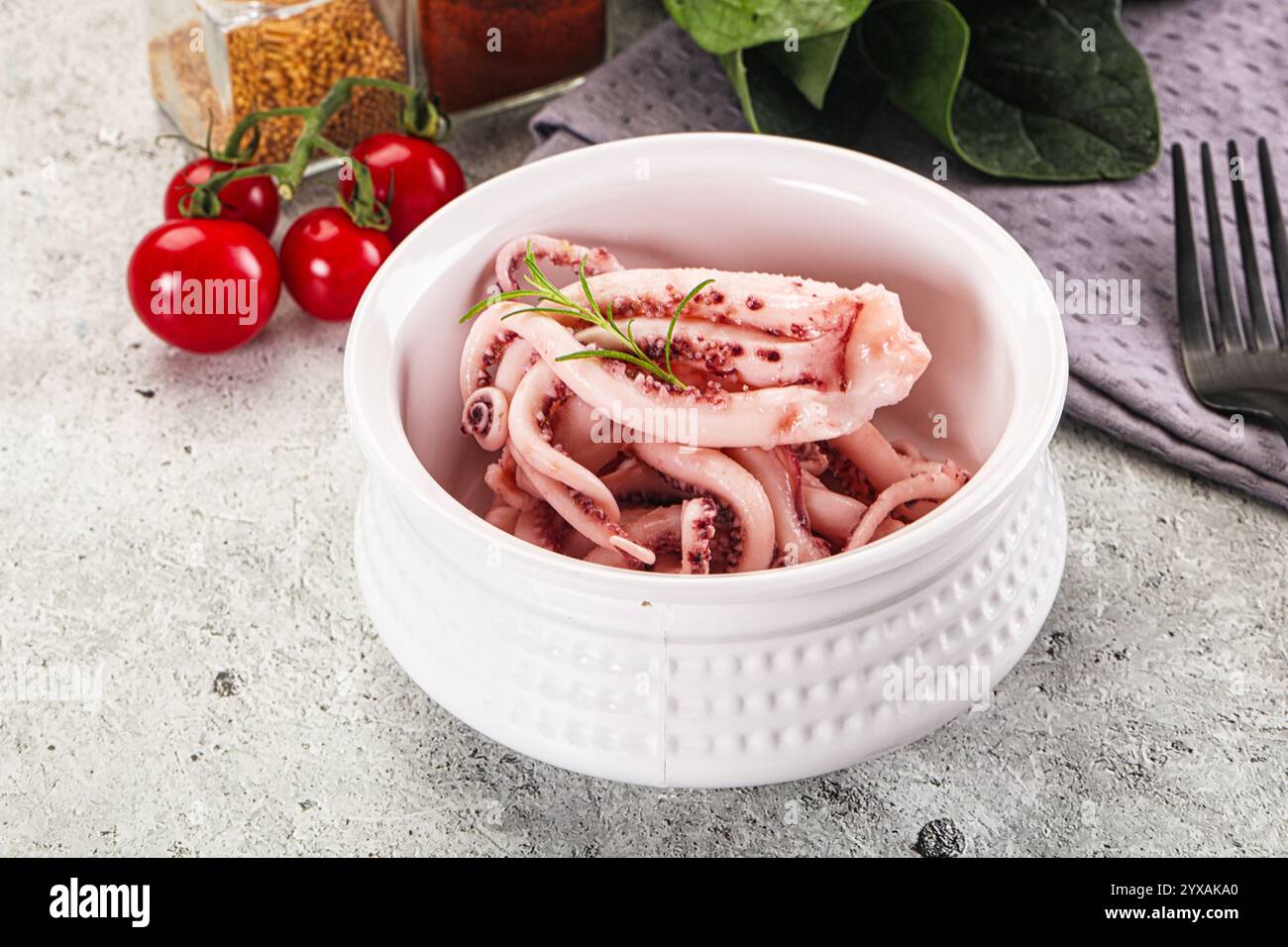 Marinated squid tentacles in the bowl for snack or salad Stock Photo ...