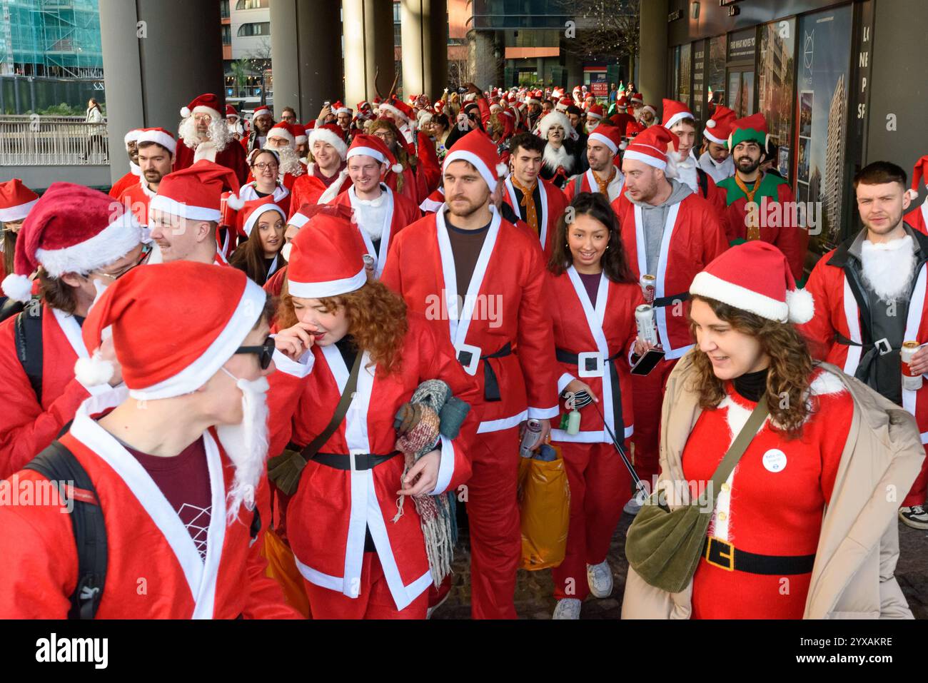London, UK. 14 December 2024. Hundreds of Santas gather to celebrate ...