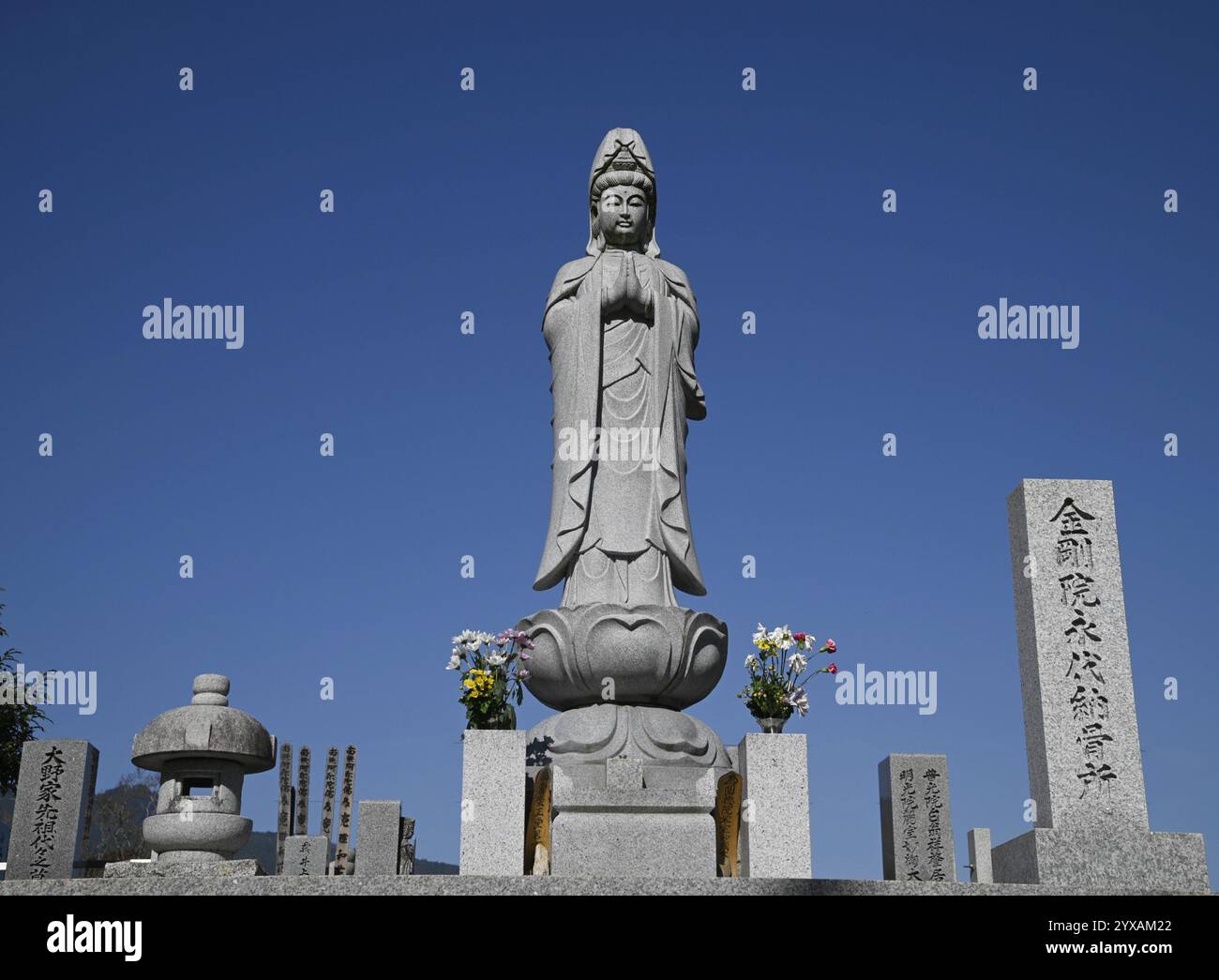 Buddhist stone statue on the grounds of Tenryū-ji Temple in Arashiyama ...