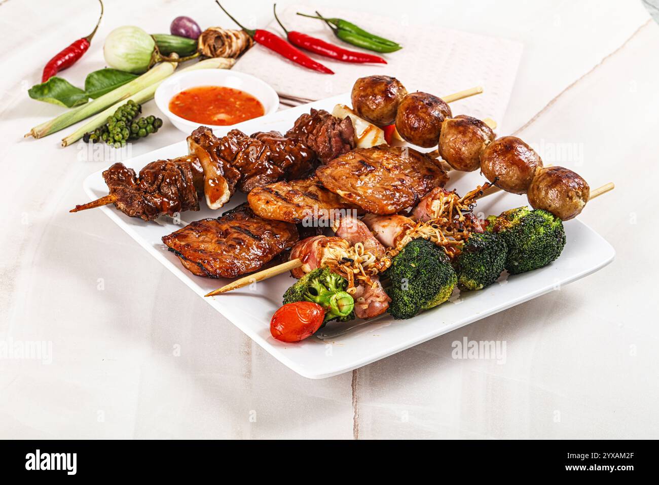 Asian grilled skewer assortment satay with beef, porl, chicken and ...