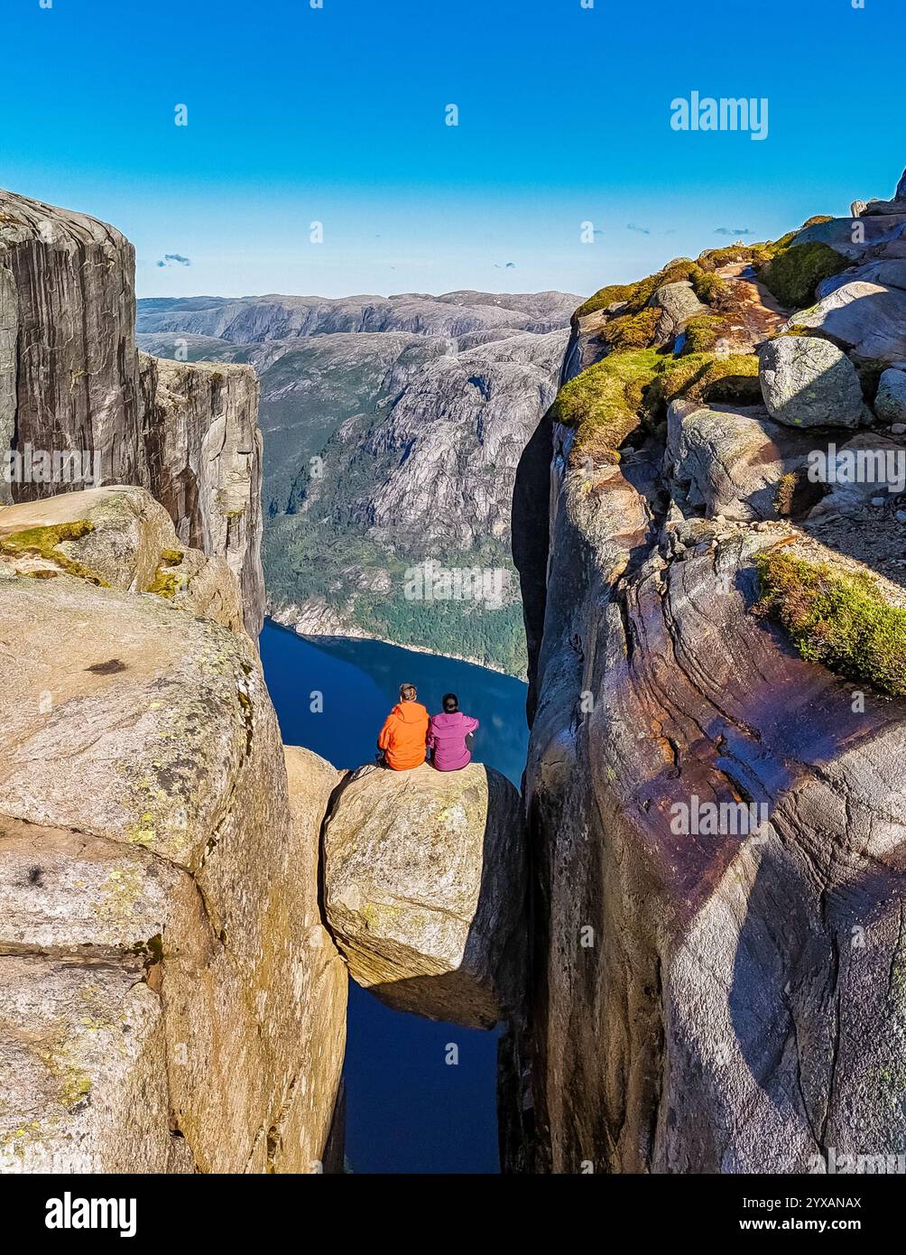 Adventure on kjeragbolten boulder hi-res stock photography and images ...