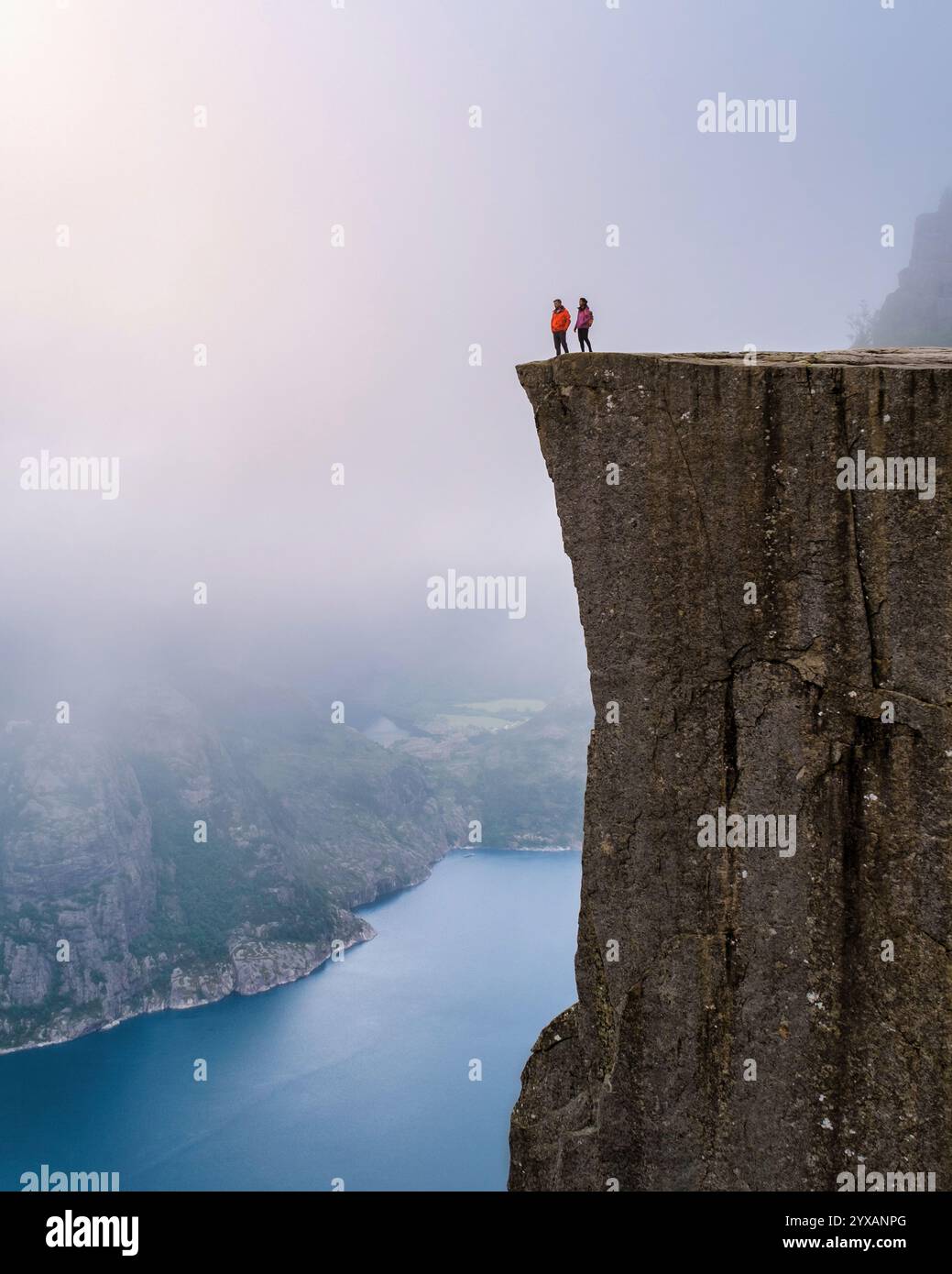 A breathtaking view from the Preikestolen cliff in Norway, with two ...