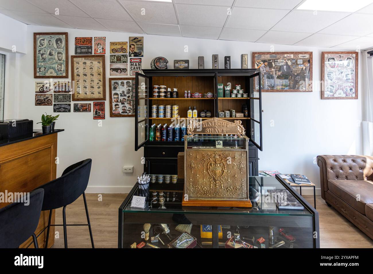 Barber shop interior featuring a vintage cash register, grooming ...