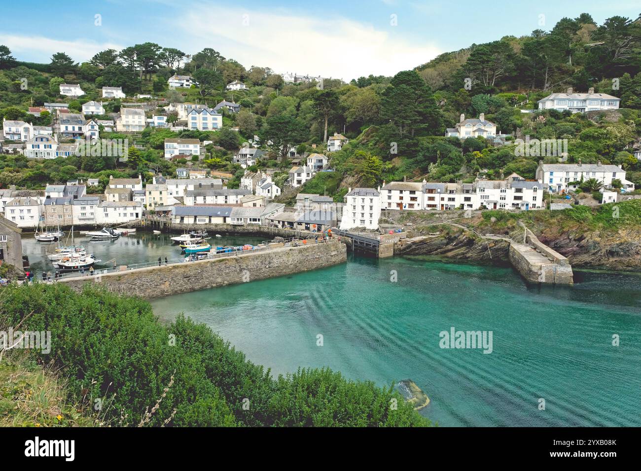 The historic fishing village and harbour of Polperro, on the Polperro ...