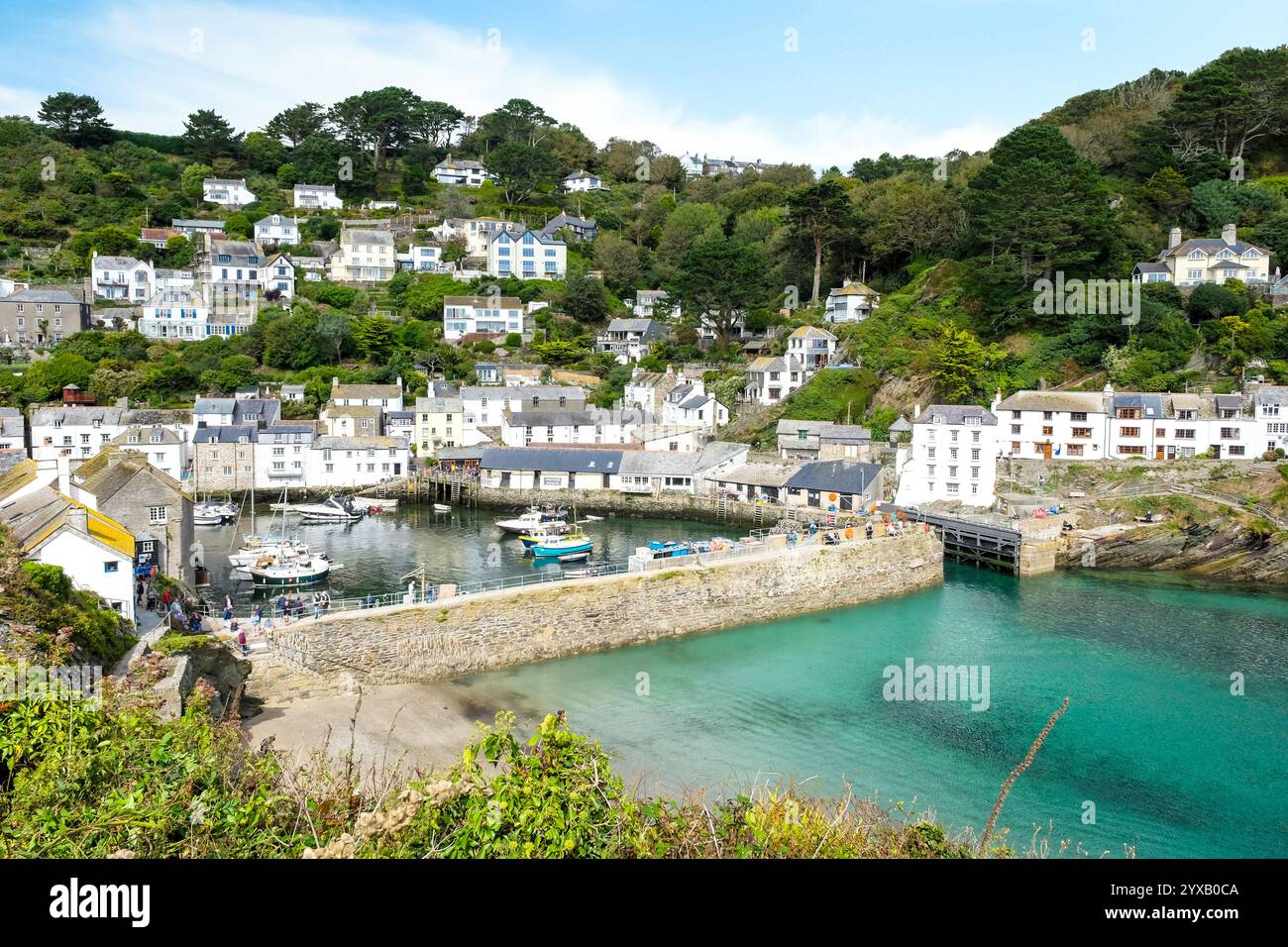 The historic fishing village and harbour of Polperro, on the Polperro ...
