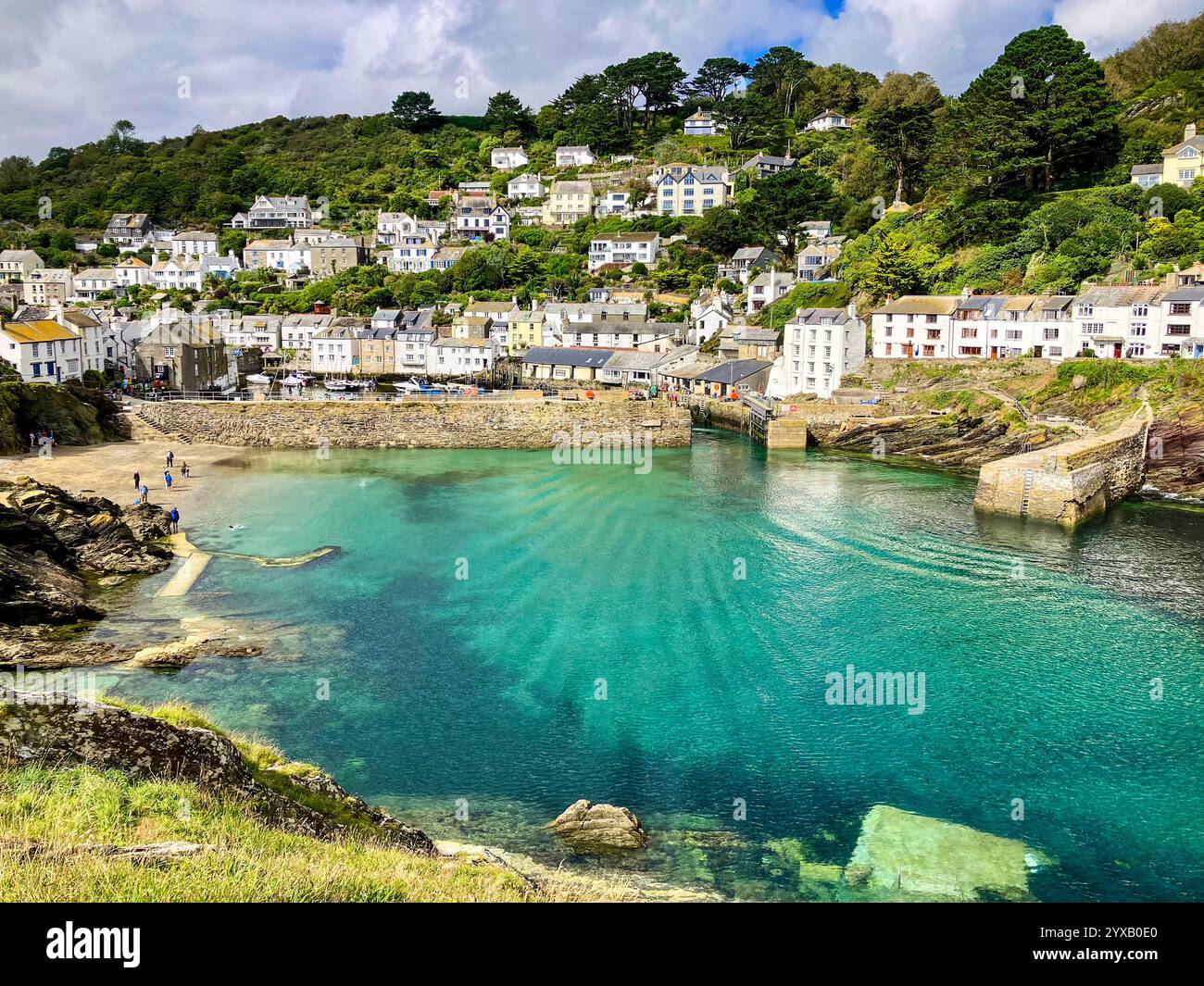 The historic fishing village and harbour of Polperro, on the Polperro ...