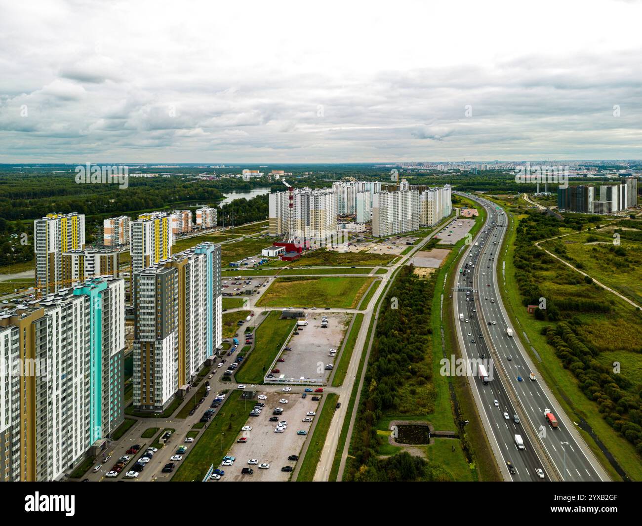 An Aerial View Showcasing Modern Urban Development Located Adjacent to ...