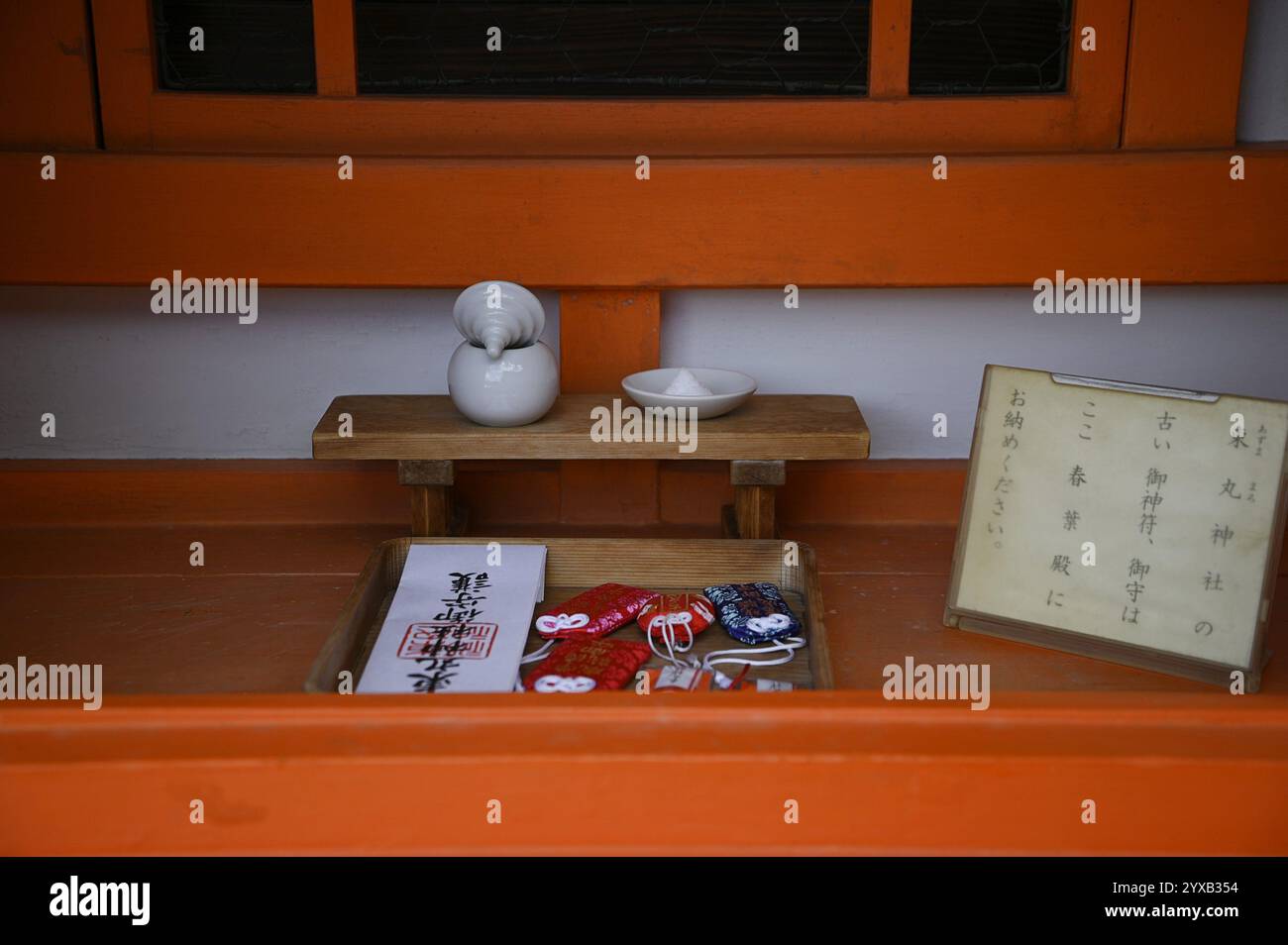 Traditional Japanese Onamori along with a porcelain incense burner at ...