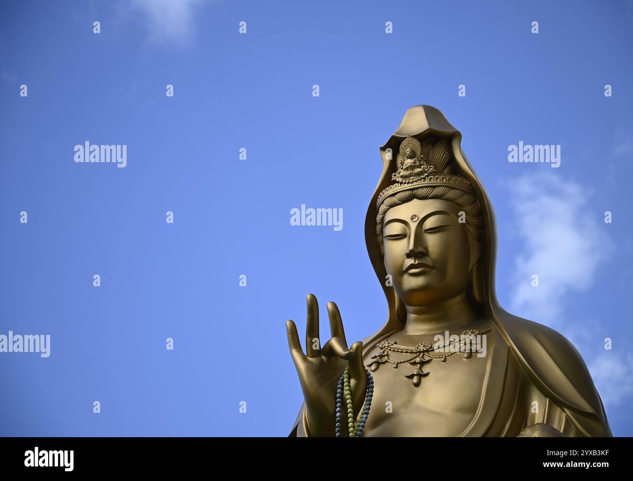 Bronze statue of Jibo Kannon near the Shinto Shrine Fushimi inari ...