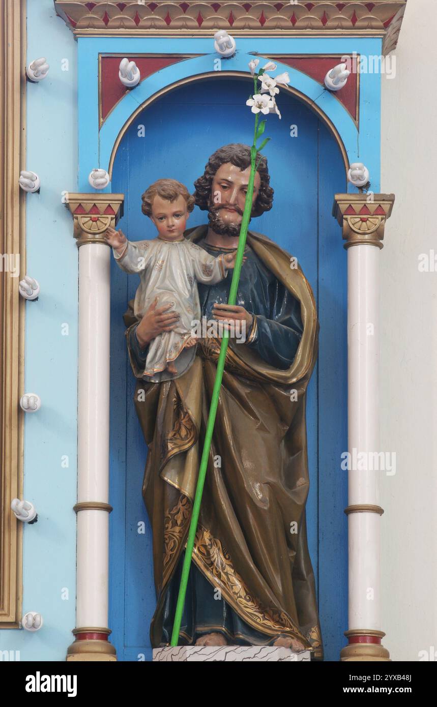 Saint Joseph with child Jesus, statue on the altar of Saint Anthony of Padua in Saint Peter ...