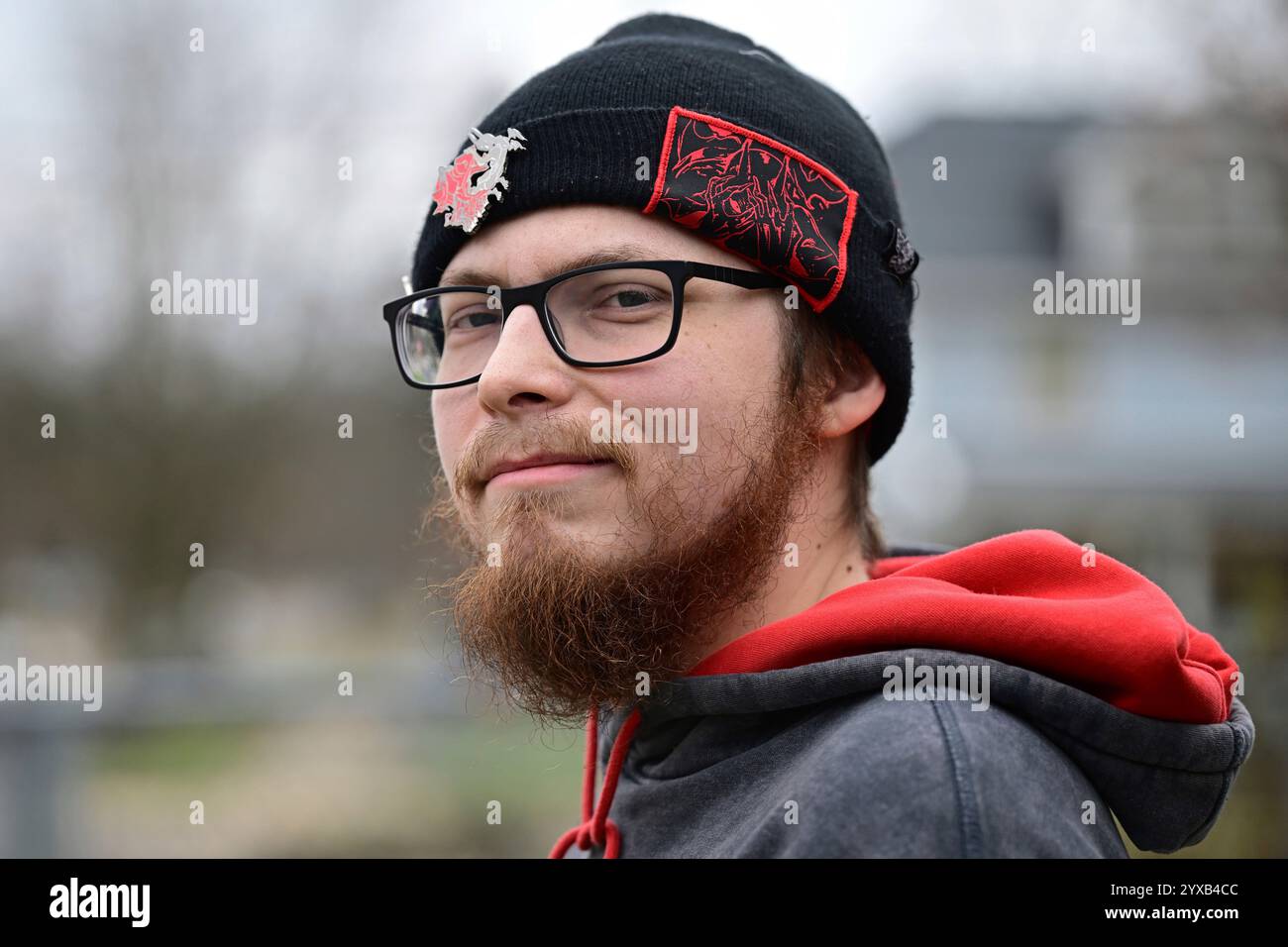 Nicholas Fontaine poses for a portrait outside his home in Akron, Ohio ...