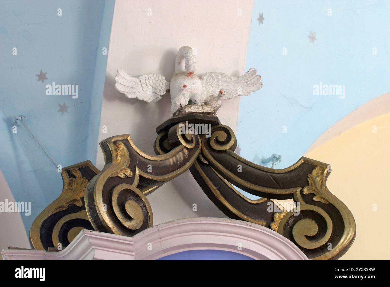 A pelican feeds its young, a Christian symbol, statue on the pulpit in ...