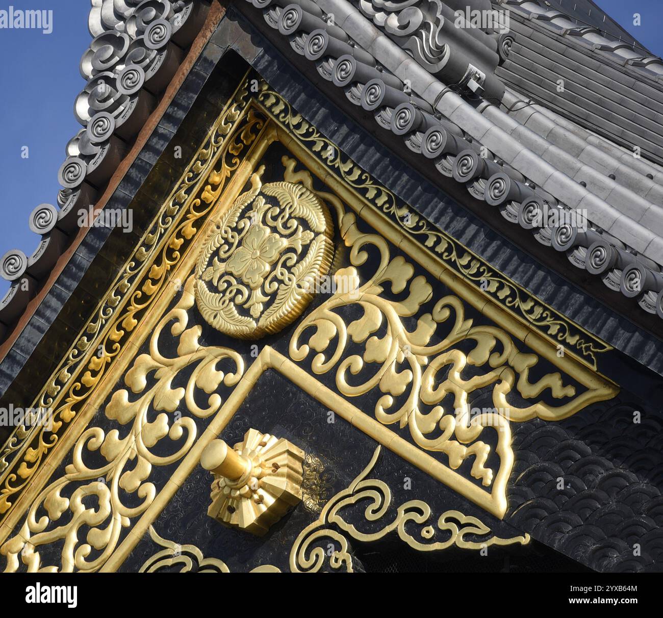 Golden handcrafted Japanese engravings on the facade of Amida-dō Hall ...