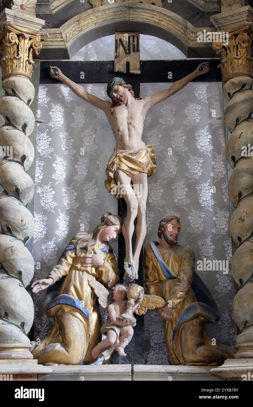 Crucifixion, Virgin Mary and Saint John under the cross, statues on the main altar in the chapel ...