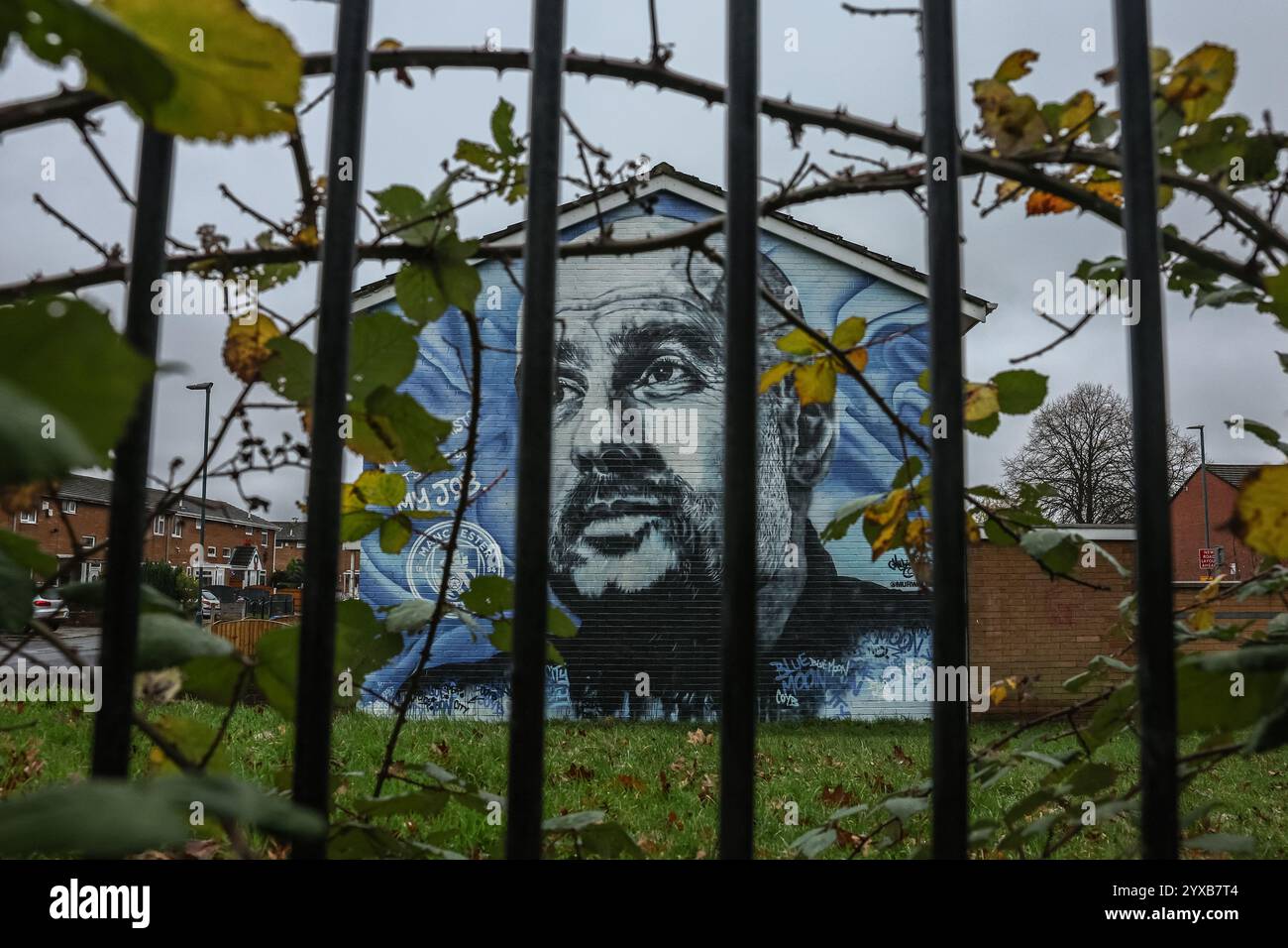 A Pep Guardiola mural in the nearby streets of the Etihad during the ...
