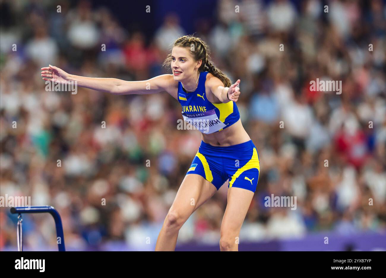 Yaroslava Mahuchikh participating in the high jump at the Paris 2024 ...