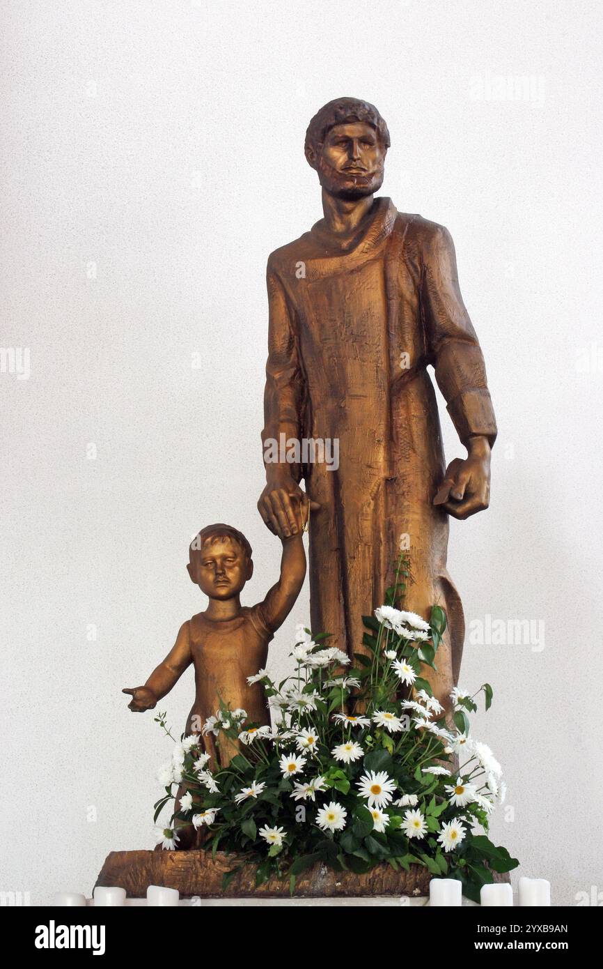 Saint Joseph with the baby Jesus, statues on the main altar in the ...