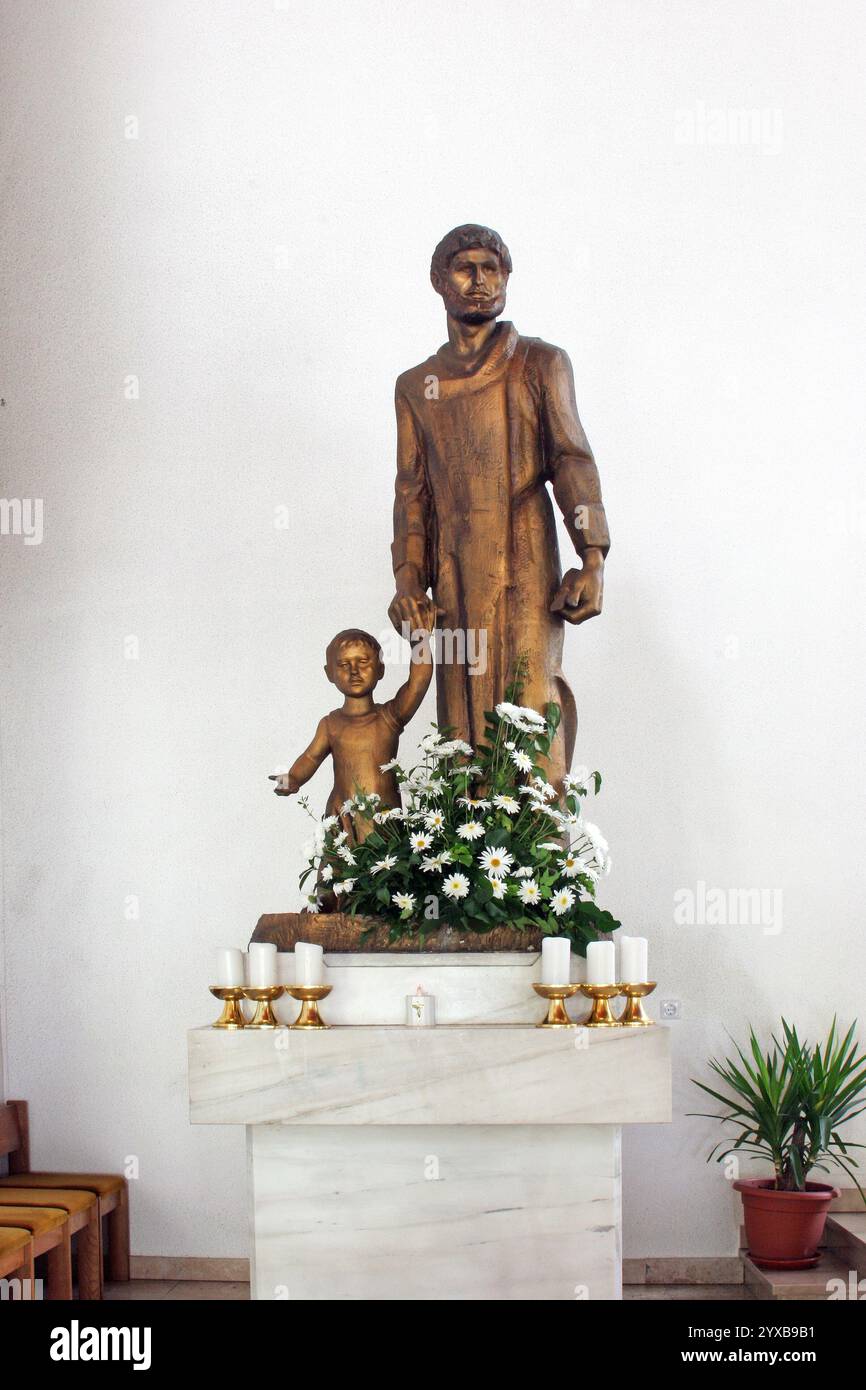 Saint Joseph with the baby Jesus, statues on the main altar in the ...