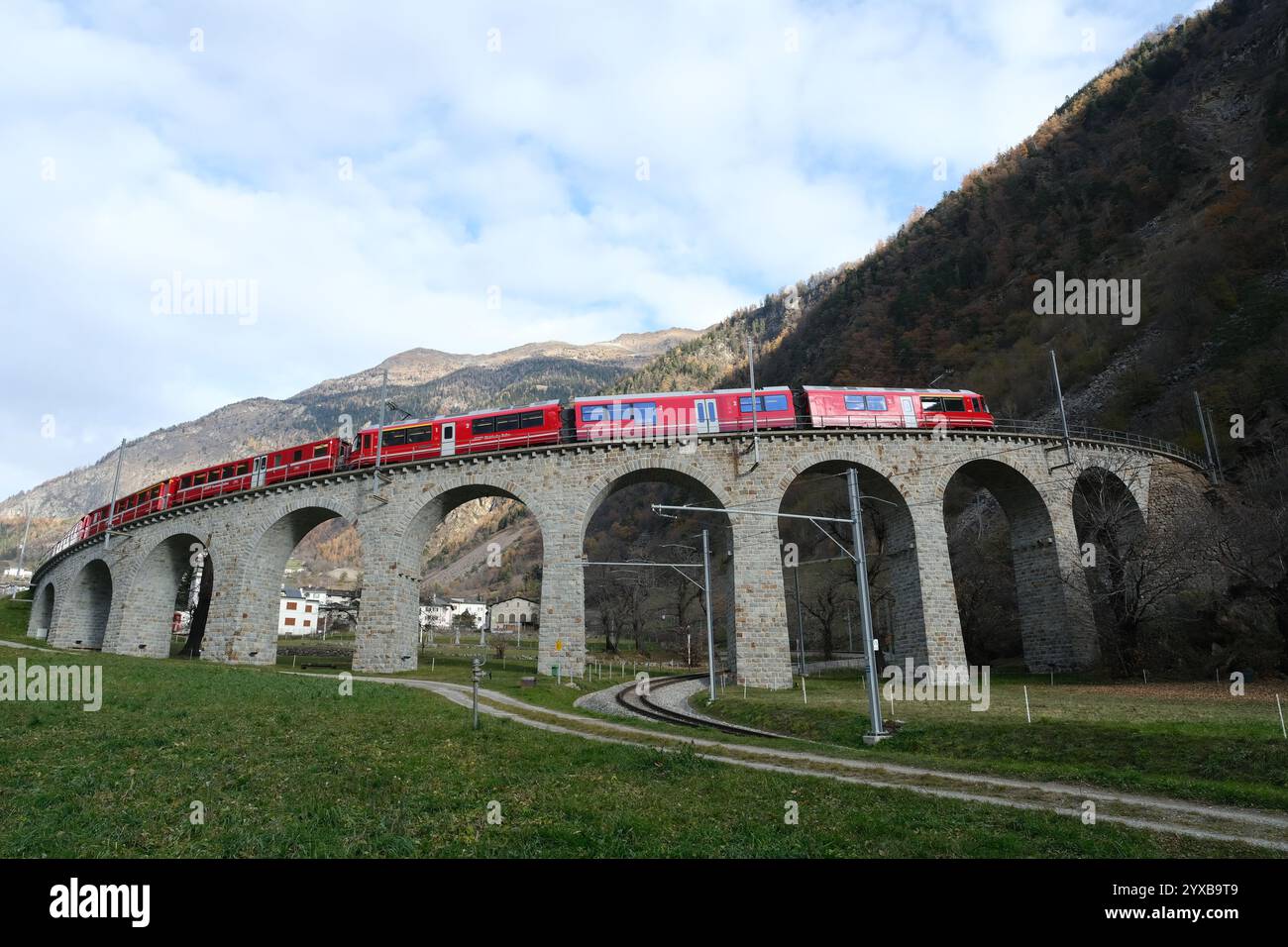 Chur. 2nd Dec, 2024. A train runs on the 360-degree Brusio Circular ...