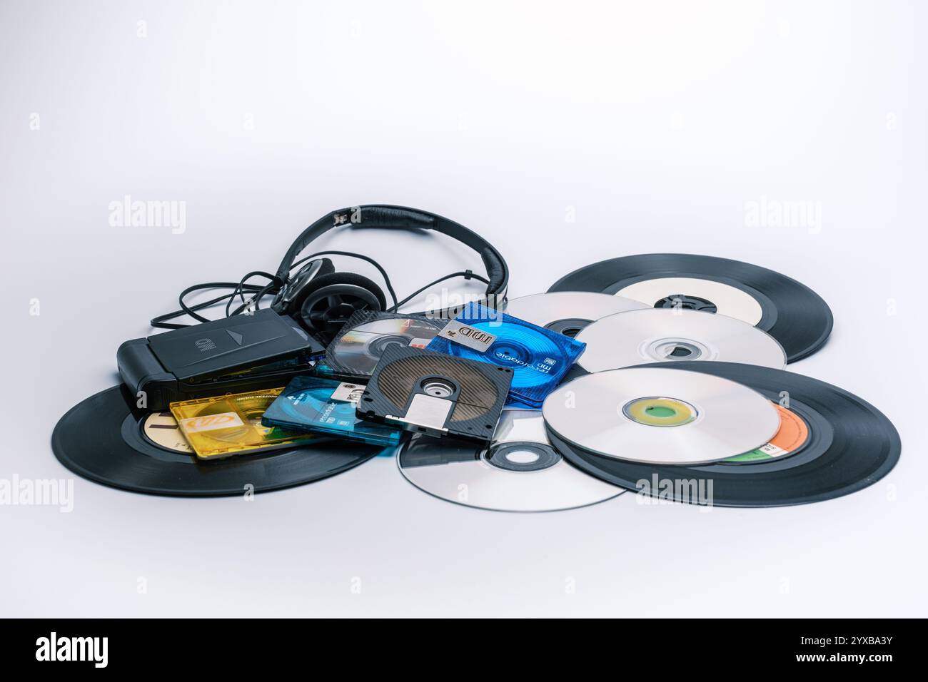 collection of various media formats including vinyl records, CDs ...