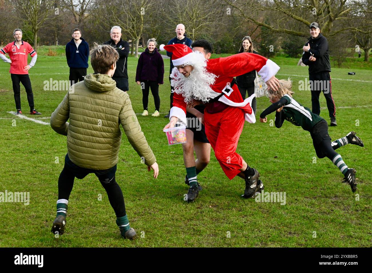 Santa getting rough treatment at Regents Park Royals Rugby Club, The ...