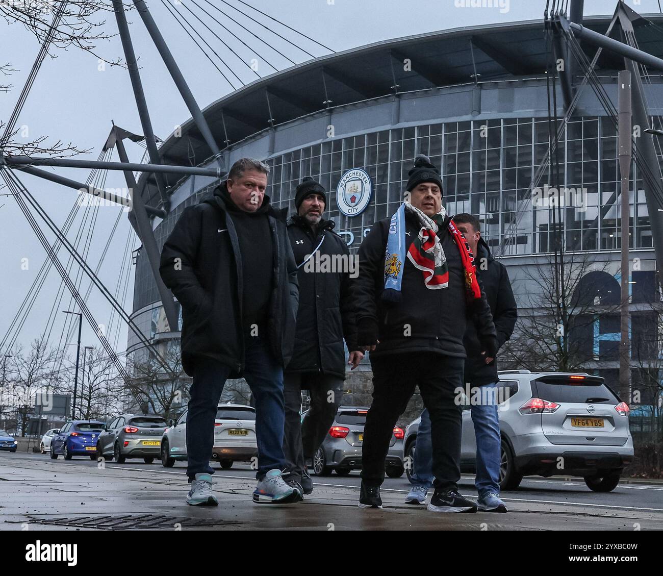 Fans outside the Etihad Stadium during the Premier League match ...