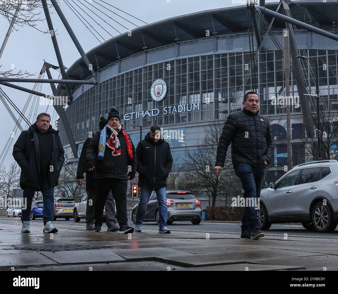 Fans outside the Etihad Stadium during the Premier League match ...