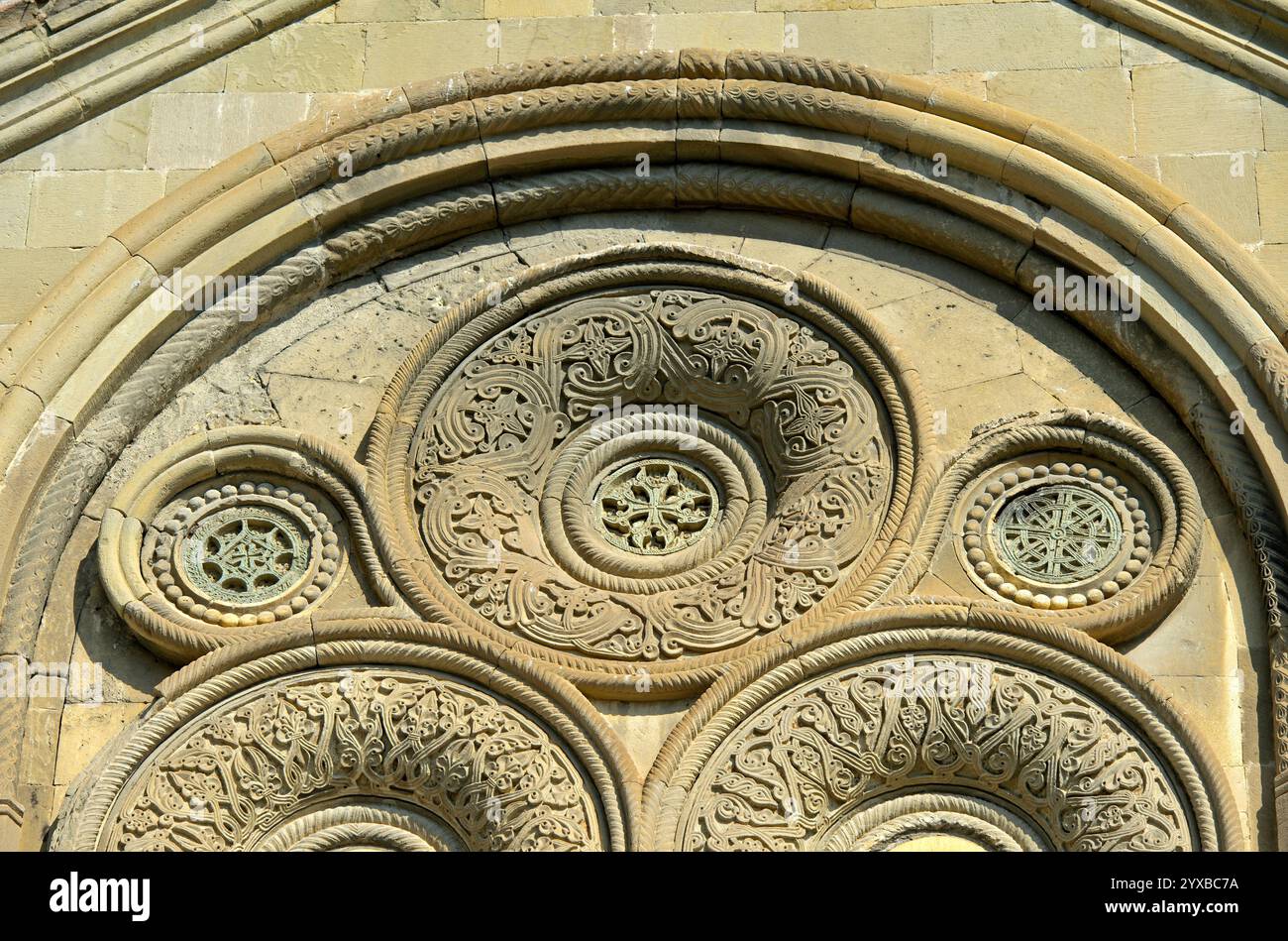 Circular sculptural decorations on the south facade of the cross-domed ...