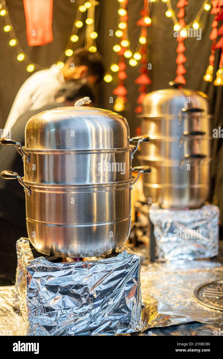 metallic steamer used to make momos dumplings bao a popular street food ...