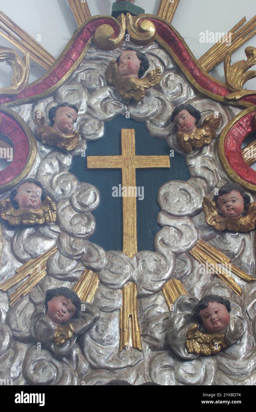 Cross surrounded by angels altar of Our Lady of Sorrows in the Church ...