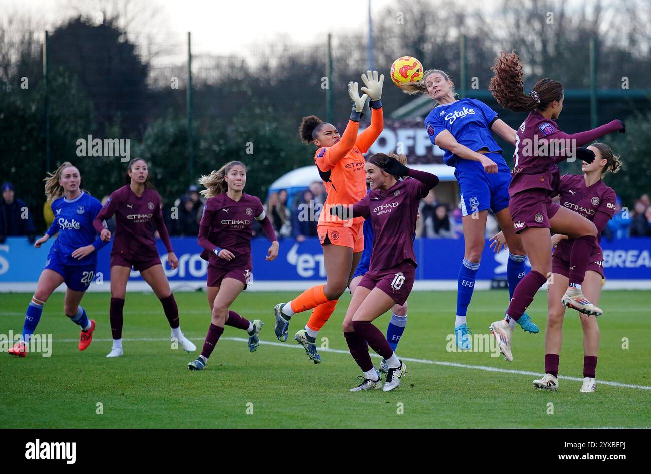 Manchester City goalkeeper Khiara Keating (centre) saves a header from ...