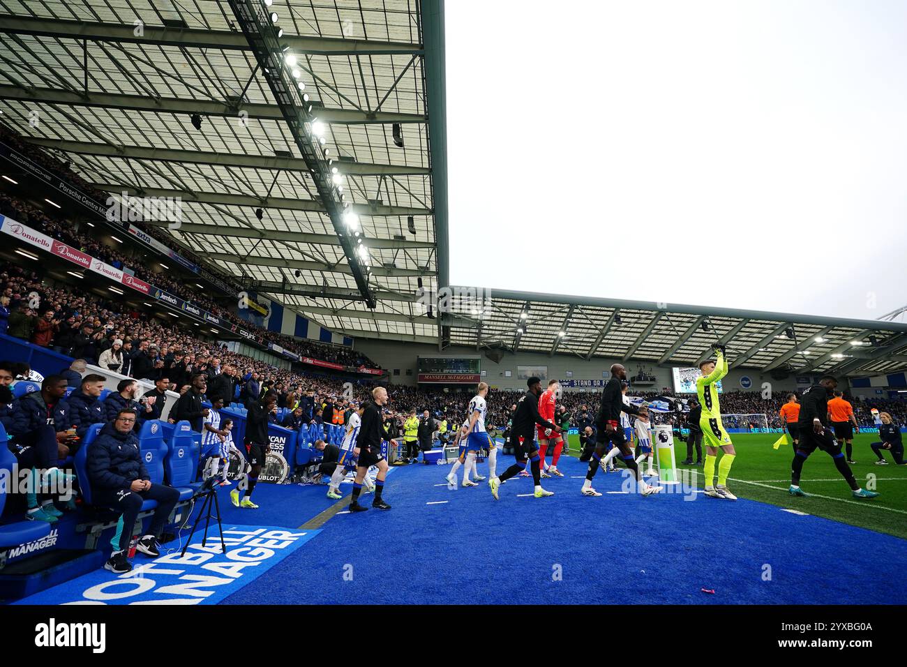 Players make their out onto the pitch ahead of the Premier League match ...
