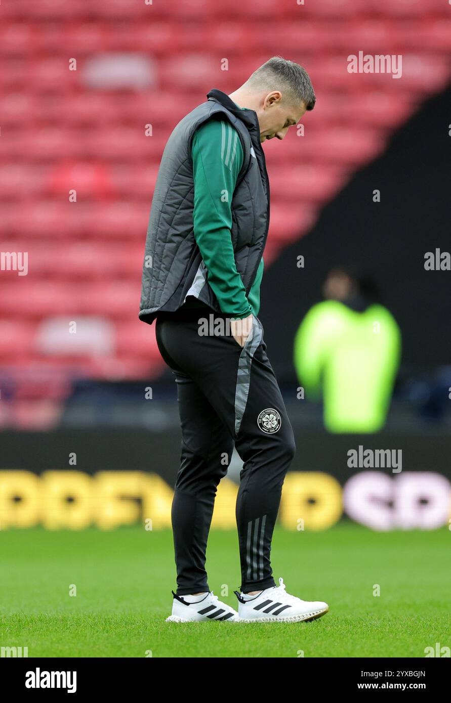 Celtic's Callum McGregor inspects the pitch before the Premier Sports ...