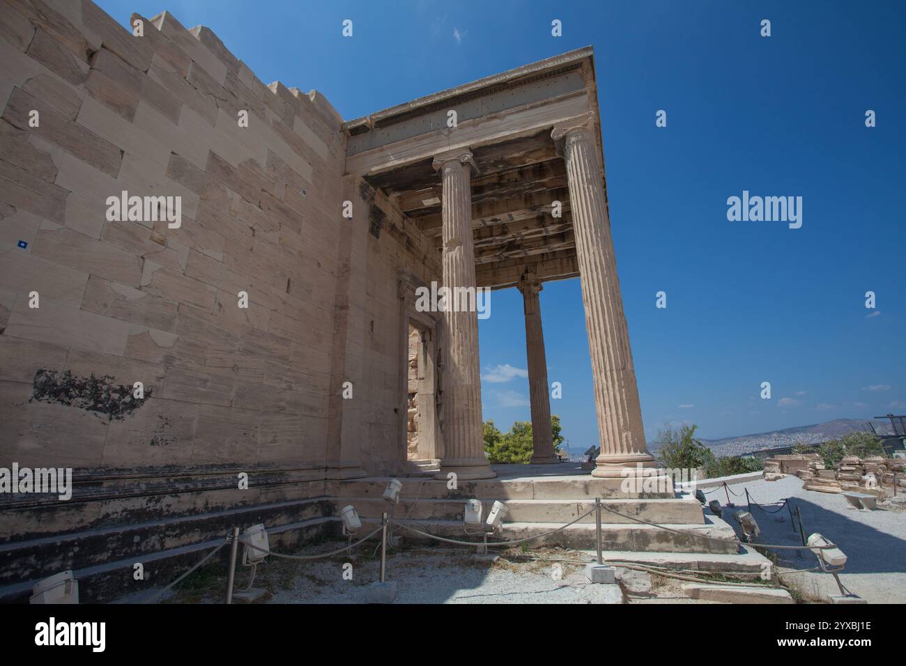 Old wall and column in Acropolis, Athens, Greece. Ancient Greek architecture Stock Photo - Alamy