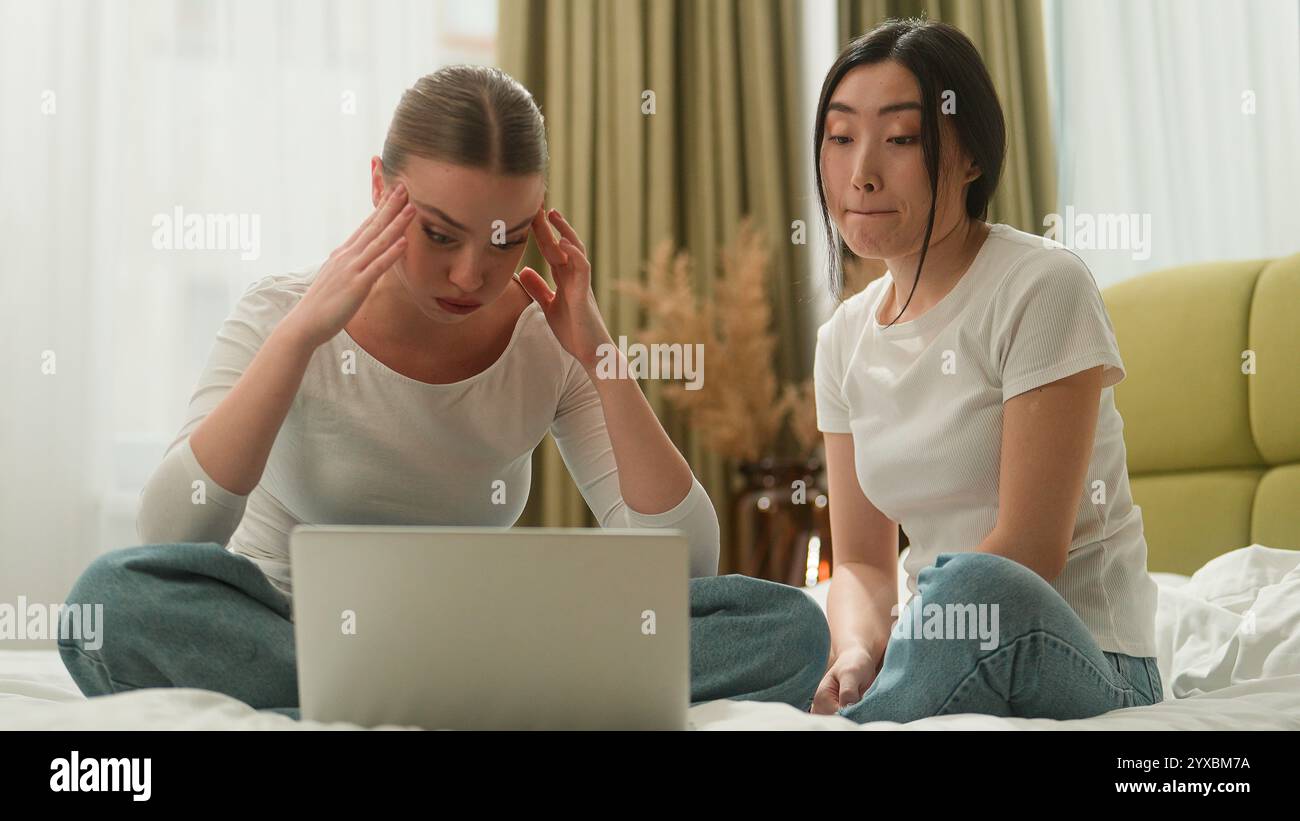 Two multiracial women upset frustrated sad worried friends female ...