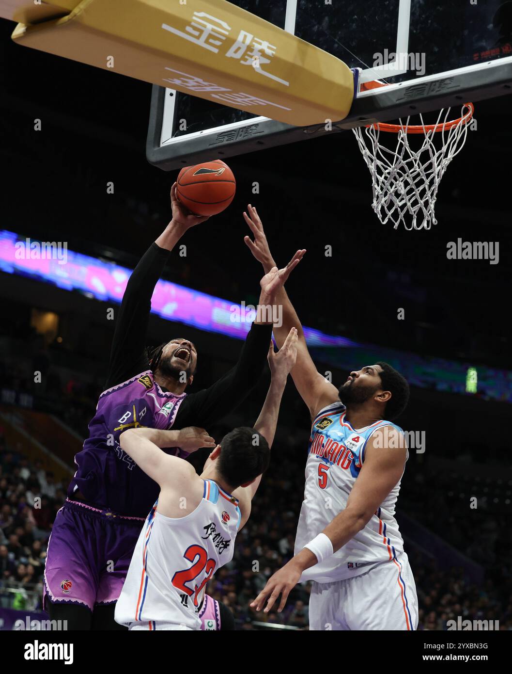 Beijing, China. 15th Dec, 2024. Jared Sullinger (L) of Beijing Royal ...