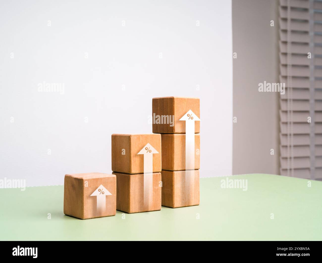 Three steps rise up arrows with percentage icon on wooden cube blocks ...
