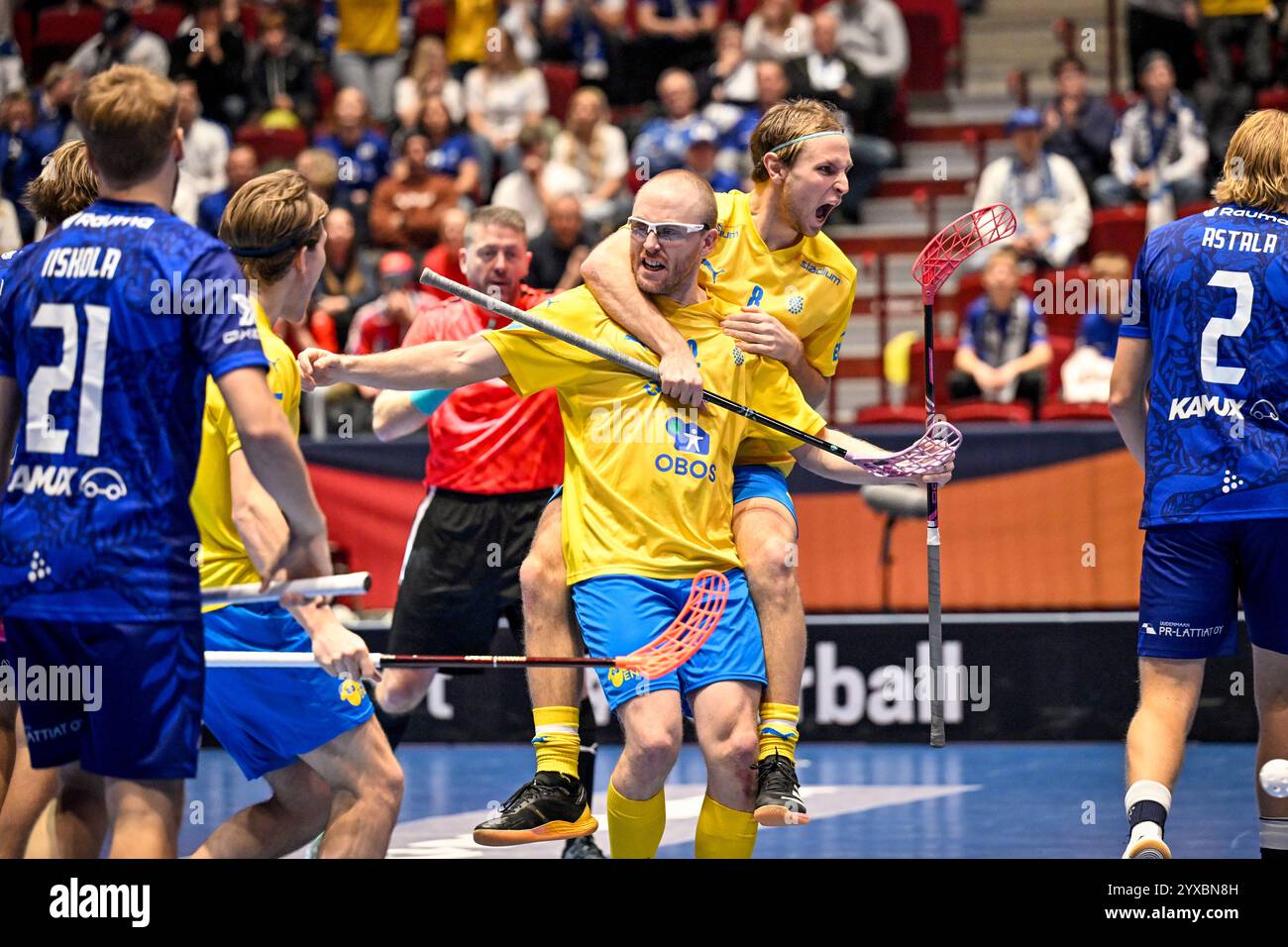 MALMÖ, SWEDEN 20241215Sweden's Johan Samuelsson (center) celebrates ...