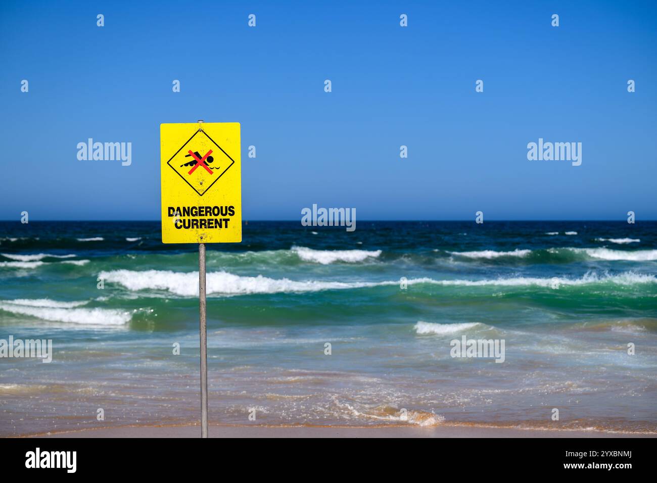 Dangerous Current warning sign on a beach Stock Photo - Alamy