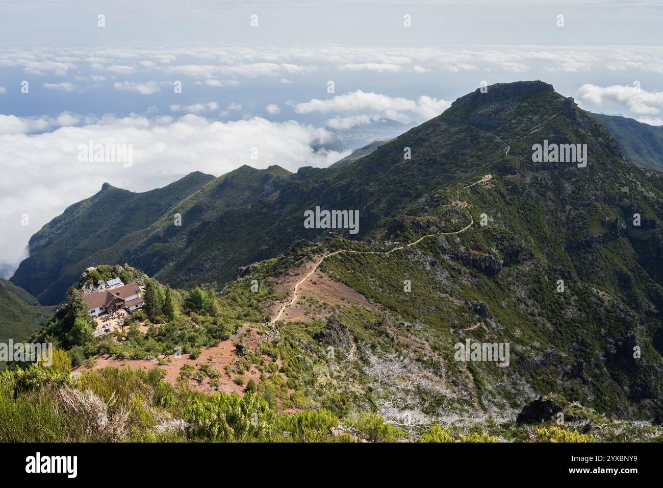 Mountainous landscape with summit trail and hut on the foot of the ...