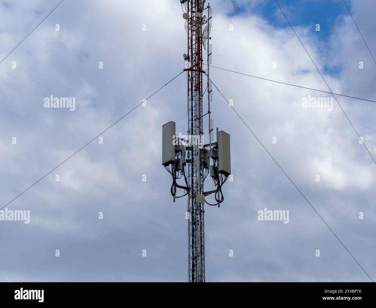 Telephone antenna telecommunication network on the sky background ...