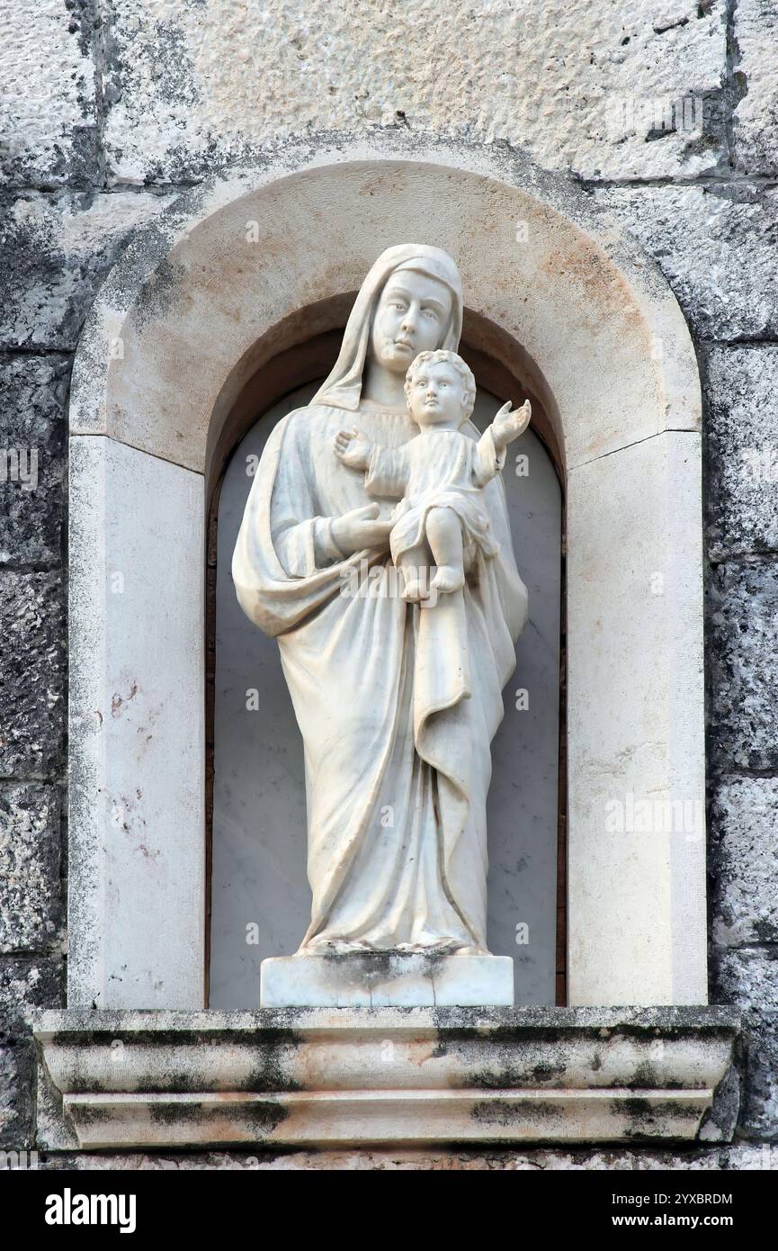 Virgin Mary with baby Jesus, statue on the portal of the chapel of Our ...