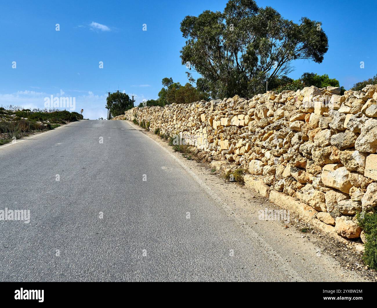 An asphalt road in the Maltese countryside Stock Photo - Alamy